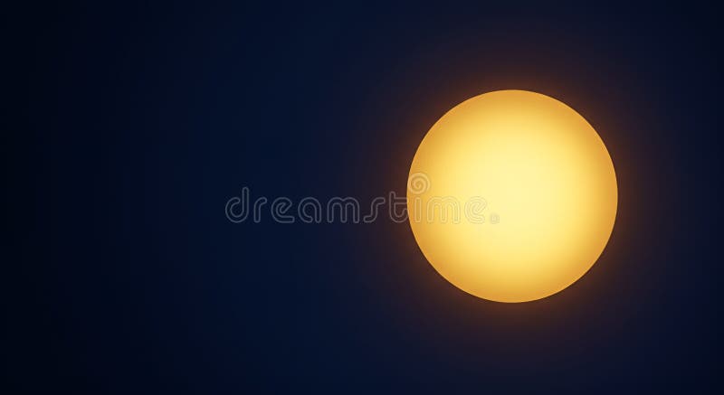 A Glowing Sphere Emitting Warm Golden Light with Soft Rays, Creating a ...