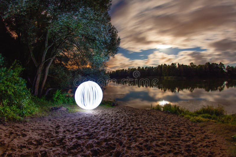 Luminous Sphere Near the Lake Stock Photo - Image of landscape, night ...