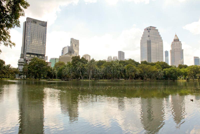 Lumpini Park in Bangkok editorial photography. Image of couple - 80451057