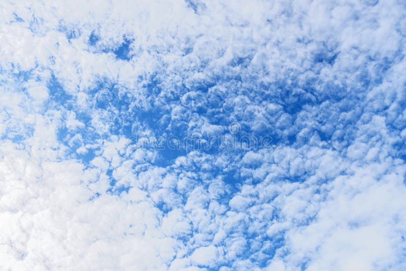 Lumpy Clouds on Blue Sky Background Stock Photo - Image of background ...