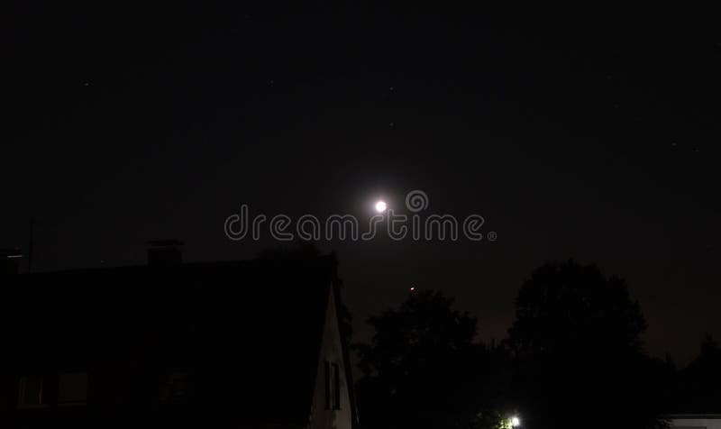 Lunar Eclipse over Germany stock photo. Image of dark - 202069280