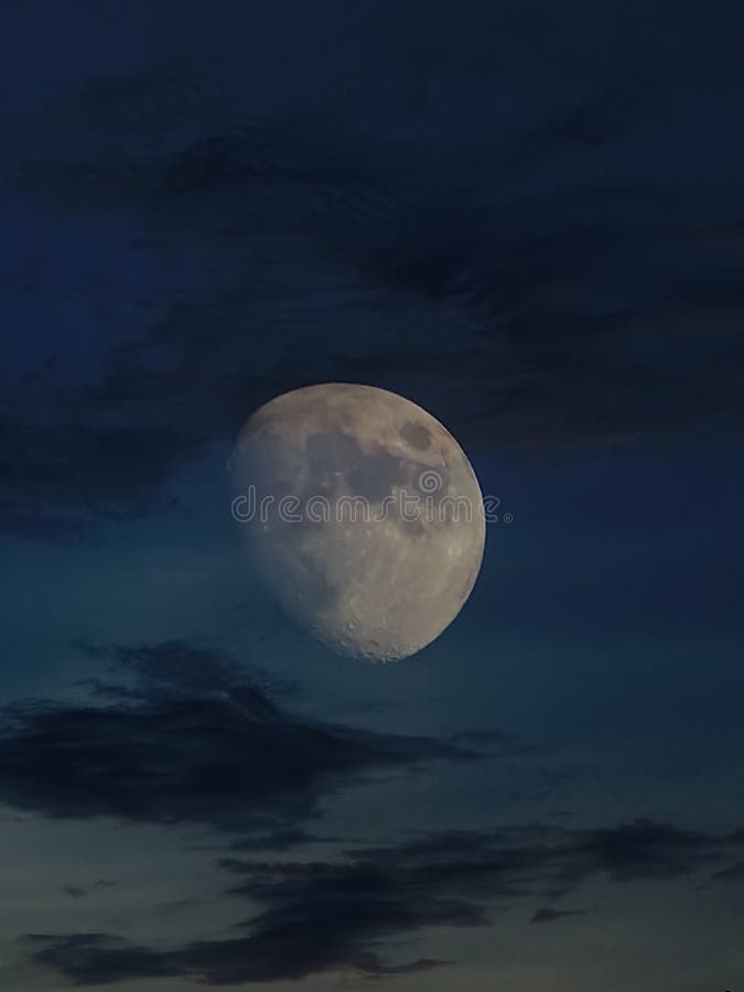 Lunar Eclipse Whit Clouds in Blue Hour Stock Photo - Image of ...