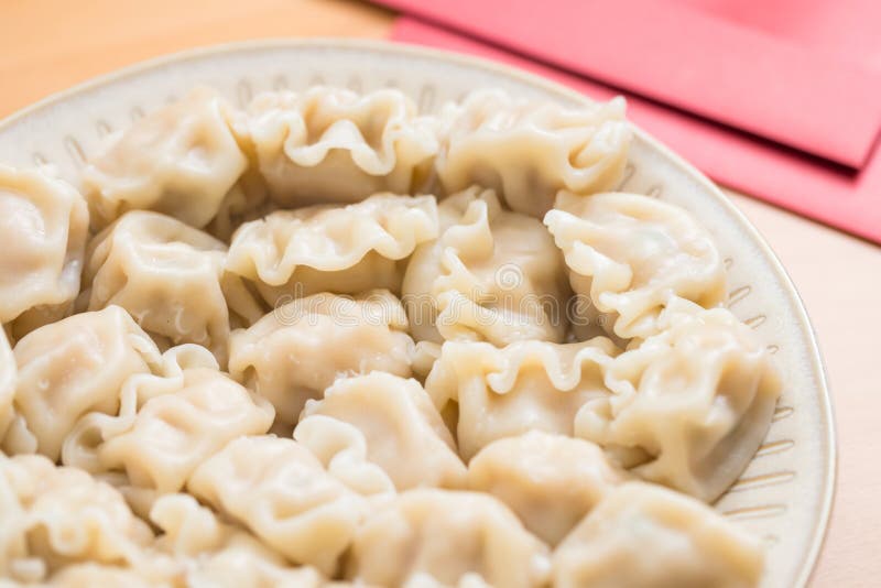 Lunar New Year Dumplings with Red Packet Stock Photo - Image of ...