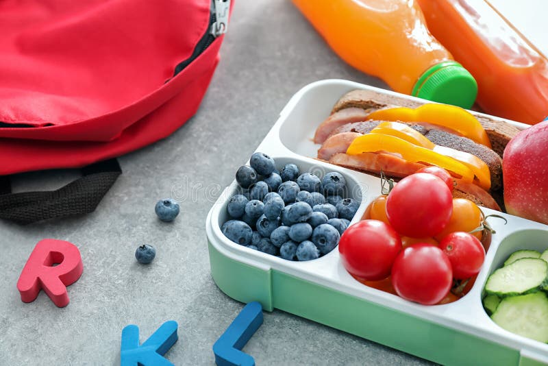 Lunch Box with Appetizing Food on Grey Table Stock Photo - Image of ...