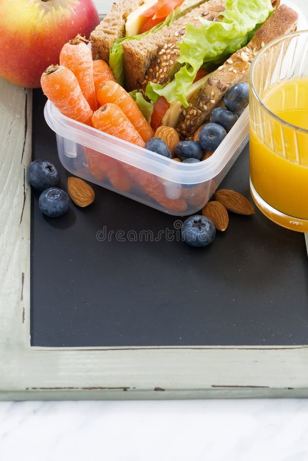 Lunch Box with Sandwich of Wholemeal Bread on Blackboard Stock Image ...