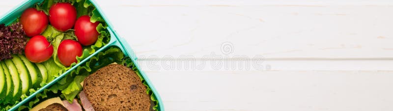 Lunch Box with Sandwiches and Fresh Vegetables Top View with Copy Space ...