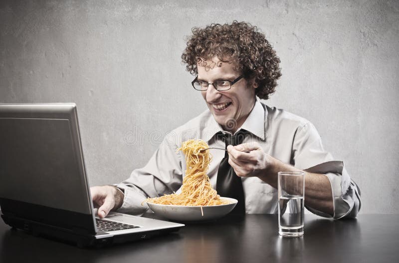 Man Eating Spaghetti Using Computer Stock Photos - Free & Royalty-Free ...