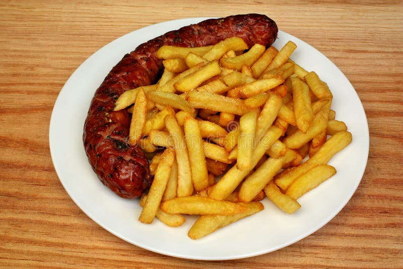 Lunch fries with sausage stock image. Image of dining - 35275851
