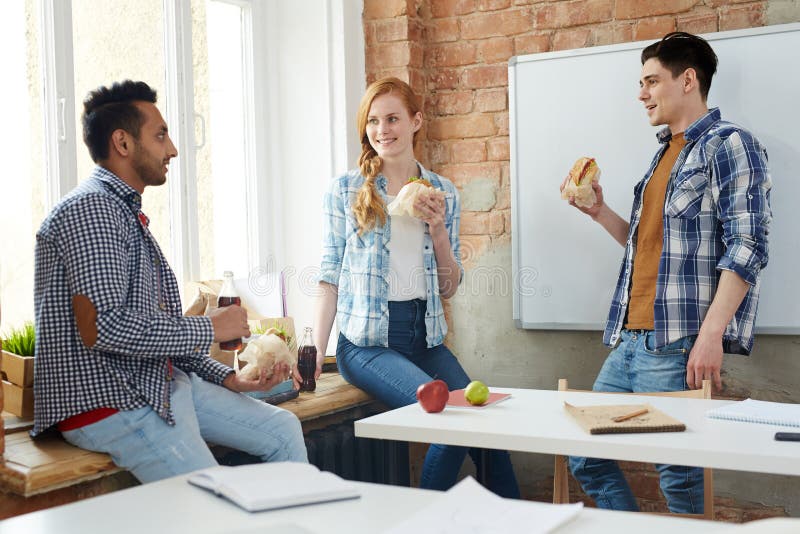 Lunch of groupmates stock image. Image of drink, classroom - 97464041