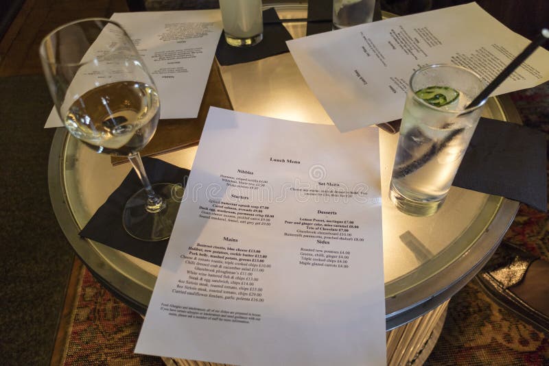 Lunch Menus and Drinks on a Round Table Stock Photo - Image of glasses ...