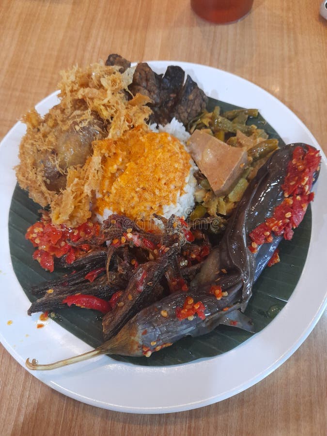 Lunch at Padang Restaurant stock image. Image of eggplant - 262143029