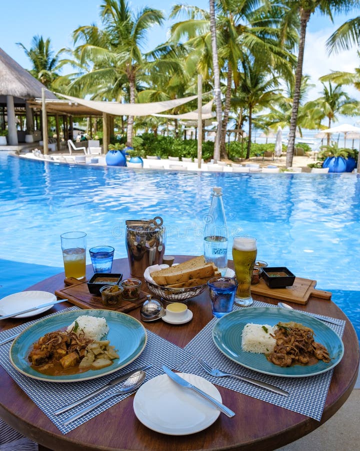Lunch by a Swimming Pool during Vacation in Mauritius, Tropical Setting ...