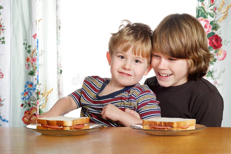 Lunchtime stock photo. Image of child, adult, hungry, eating - 633398