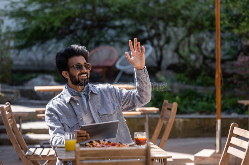 Hindu Young Man Having Lunch in Pizzeria Stock Photo - Image of ...