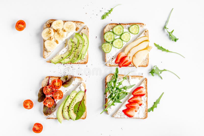 Lunch with Triangle Sandwiches on White Table Background Top View ...