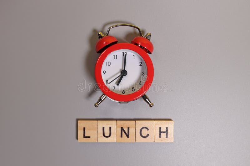 Lunch Word and Alarm Clock on Gray Background Stock Photo - Image of ...