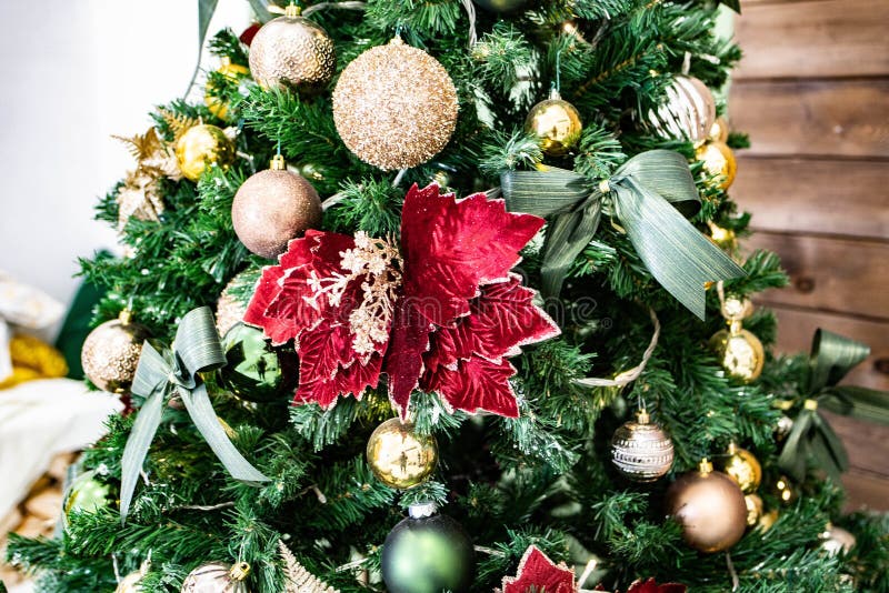 Lush Christmas Tree with Gold Ornaments Stock Photo - Image of bright ...