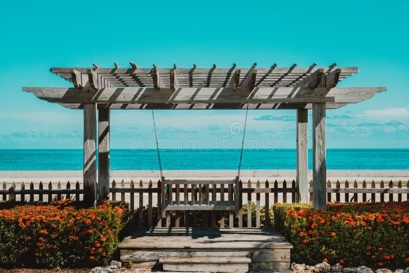Lush Garden with a Picket Fence, Situated on a Beachfront Property ... Lush Garden with a Picket Fence, Situated on a Beachfront Property ...
