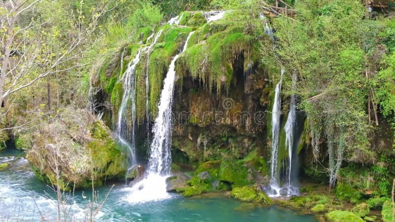 Lush Green Moss-Covered Cliffs with Multiple Cascading Waterfalls Stock ...