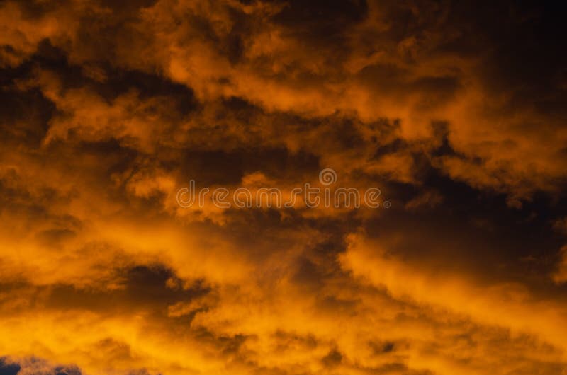 Lush, Heavy Clouds, Painted Orange by the Sun at Sunset. Texture. Stock ...