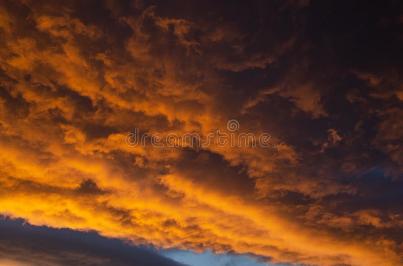 Lush, Heavy Clouds, Painted Orange by the Sun at Sunset. Texture. Stock ...