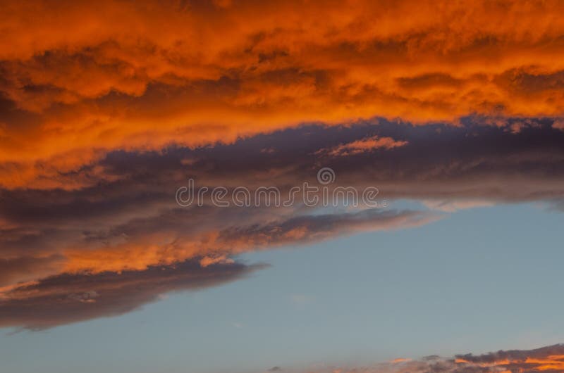 Lush, Heavy Clouds, Painted Orange by the Sun at Sunset. Texture. Stock ...