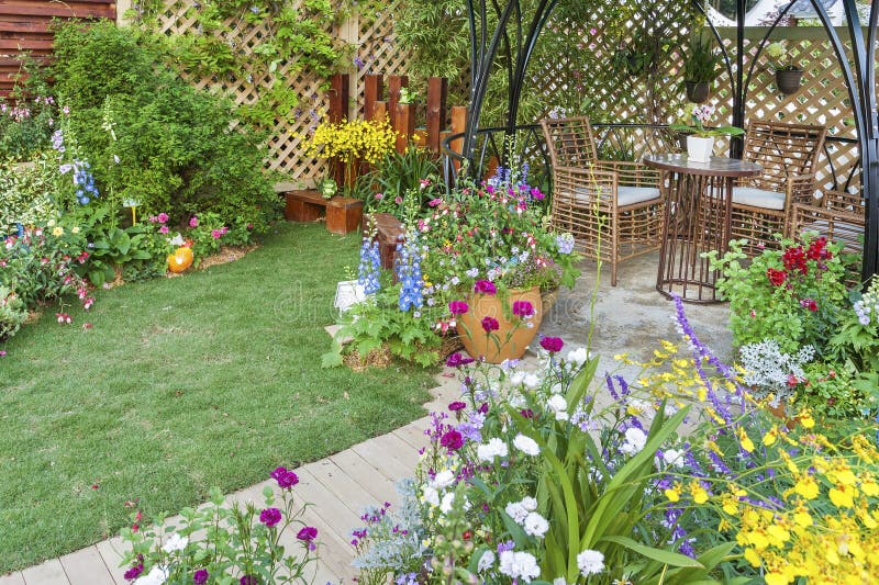 Backyard flower garden stock image. Image of house, lawn - 196808059