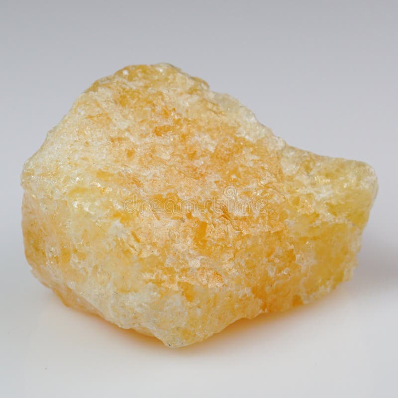 Lustrous Yellow Calcite Crystal on Pristine White Background Stock ...