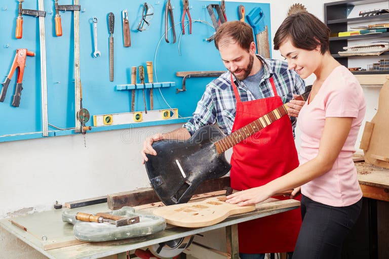 Luthier and apprentice stock image. Image of apprenticeship - 99628751