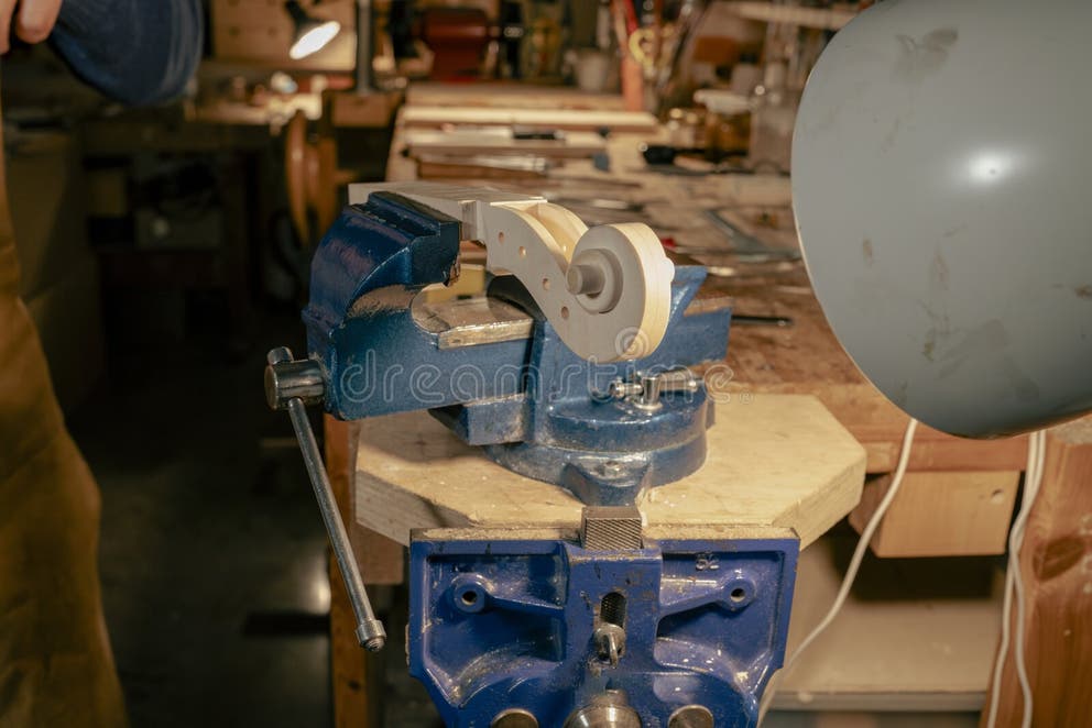 Luthier Crafting Violin Scroll Using Vise and Lamp in Workshop Stock ...