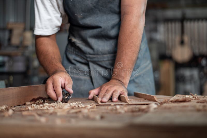 Luthier Creating a Guitar and Using Tools in a Traditional Stock Photo ...