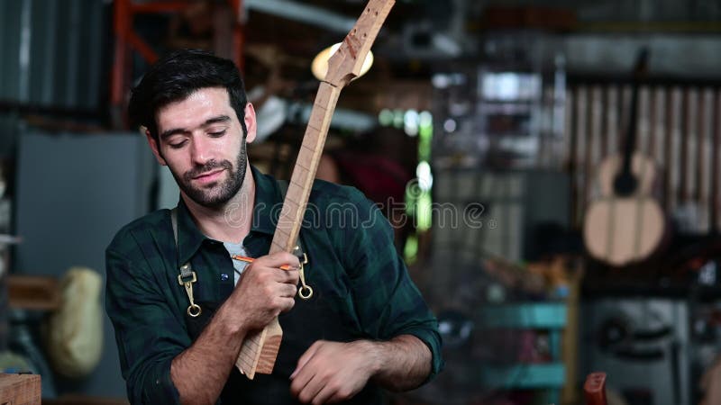 Luthier Making Top of Guitar Using Traditional Tools in Workroom with ...