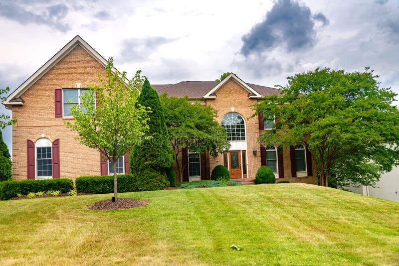 Luxurious Brick House in Suburb. Beautiful House with a Large Lawn ...