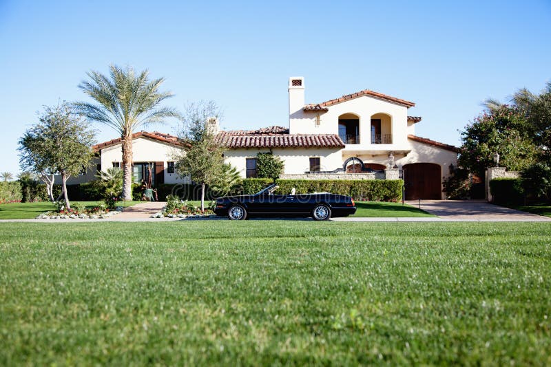 Luxurious Convertible Car Parked in Front of a Mansion House Stock ... Luxurious Convertible Car Parked in Front of a Mansion House Stock ...