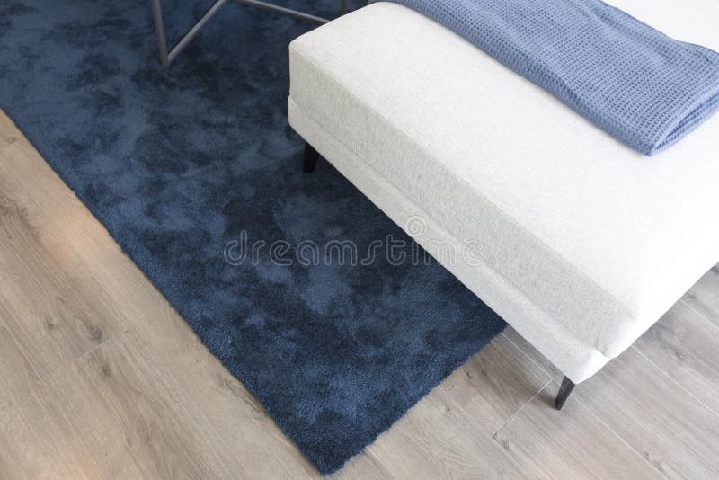 Luxurious Dark Blue Carpet and White Sofa in Living Room. Stock Photo ...