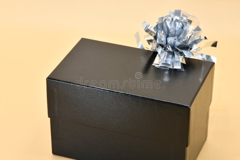 A Black Gift Box with a Silver Bow Stock Image - Image of birthday ...