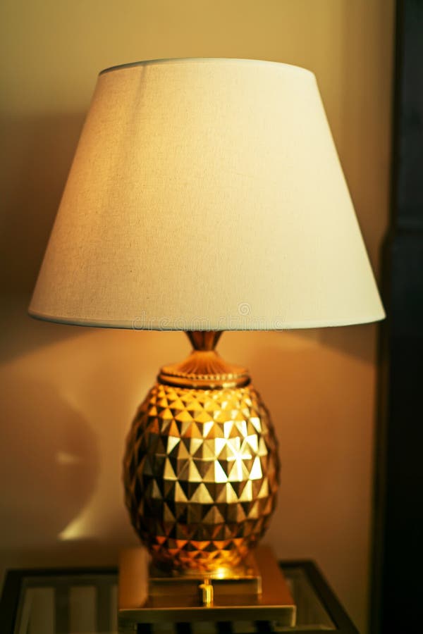 Luxurious Golden Lamp Shade Lit in a Room Stock Photo - Image of decor ...