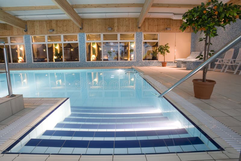 Large indoor swimming pool stock image. Image of house - 12662945