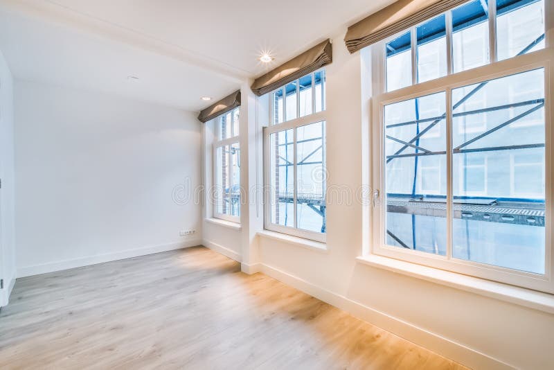 Luxurious Interior of the Room with Large Three Windows Stock Image ...