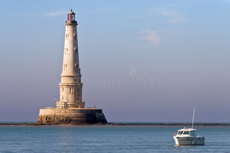 Luxurious Lighthouse and Boat Stock Photo - Image of ocean, ship: 3172966