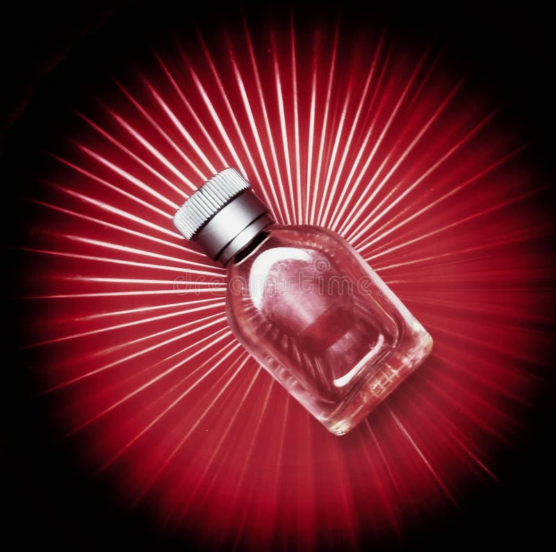 A Luxurious Perfume Bottle Displayed with Dramatic Radial Lighting ...