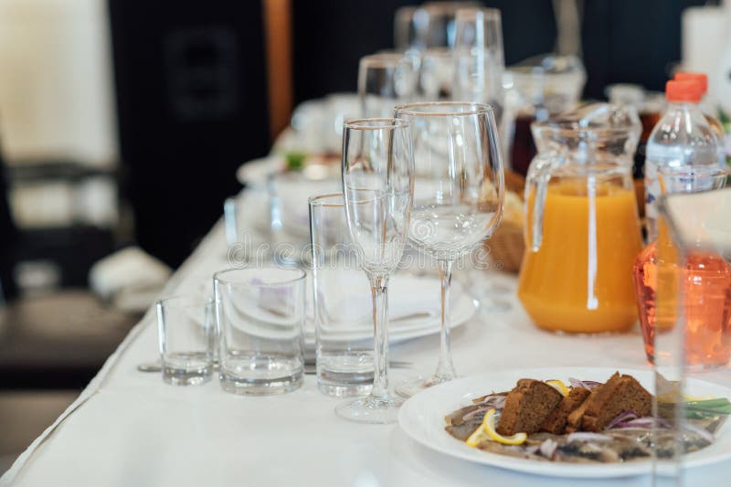 Luxurious Restaurant. Luxurious Interior, White Tables, Serving Dishes ...