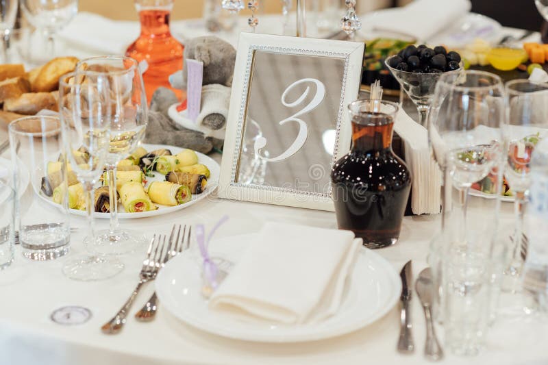 Luxurious Restaurant. Luxurious Interior, White Tables, Serving Dishes ...