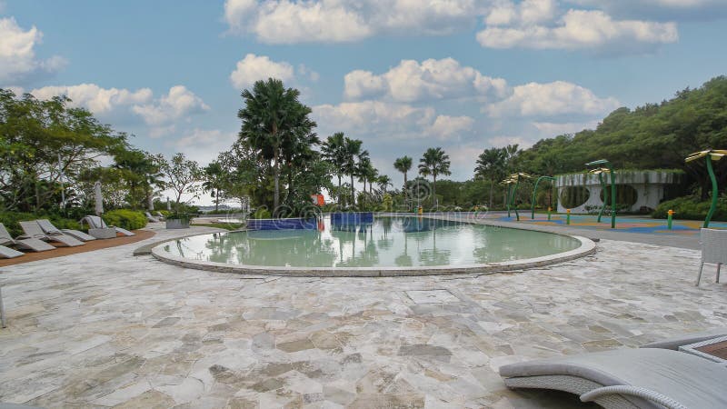 Luxurious Tropical Pool Resort Stock Photo - Image of pool, grass ...