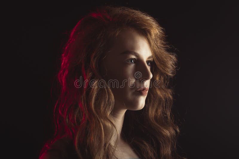 Luxurious Woman with Shadow on Her Face and Red Light Stock Image ...