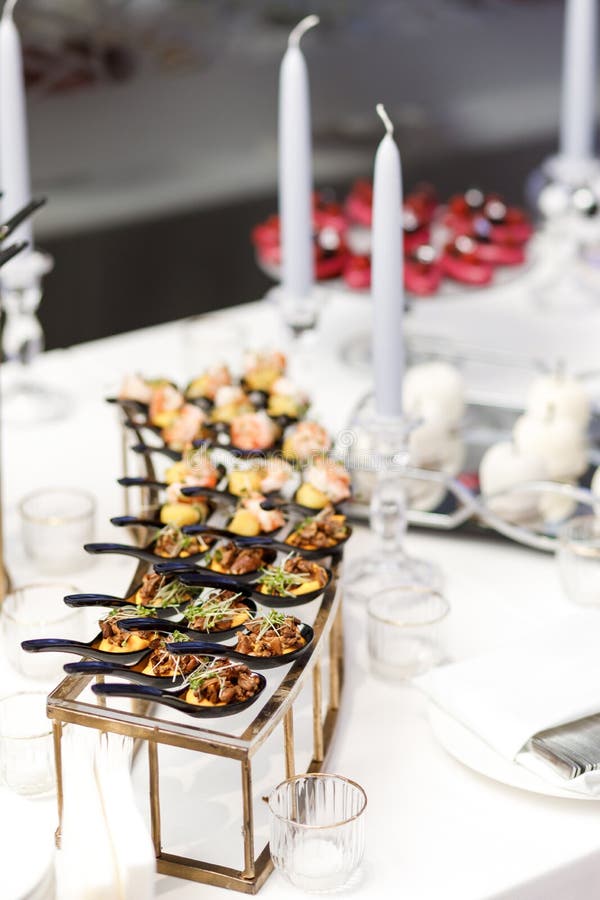 Luxury Banquet Table Setting in Restaurant. Table with the Snacks and ...