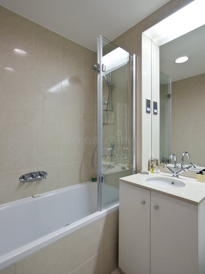 Custom Bathroom with Green Glass Countertops Stock Photo - Image of ...