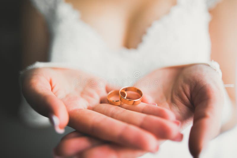 Luxury Beautiful Wedding Rings in the Hands Stock Photo - Image of ...