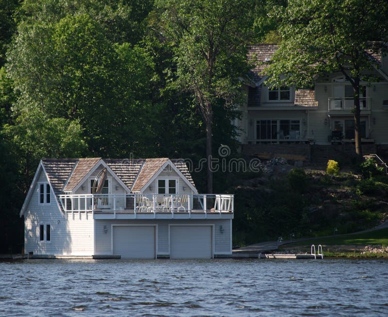 Luxury Boathouse with Living Quarters Stock Photo - Image of ontario ...