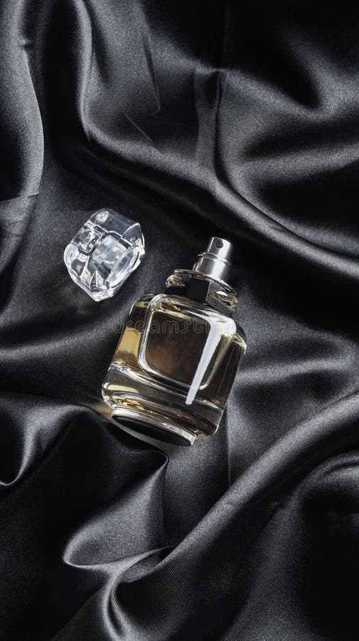Luxury Bottle of Perfume on Black Silk, Top View Stock Image - Image of ...